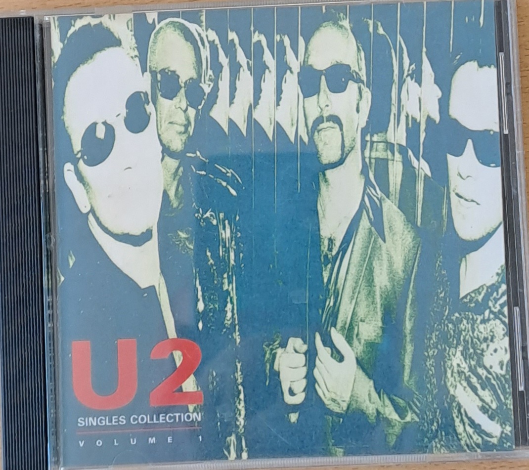 U2: Singles Collection vol. 1, 1-CD - Антикварен магазин Флимаркет